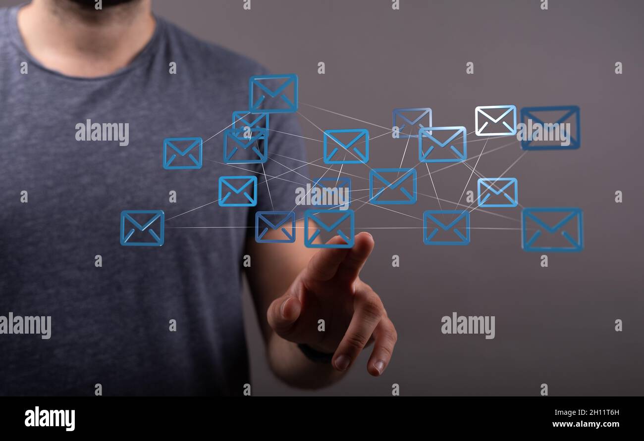 Human hand showing network communications with email symbol Stock Photo ...