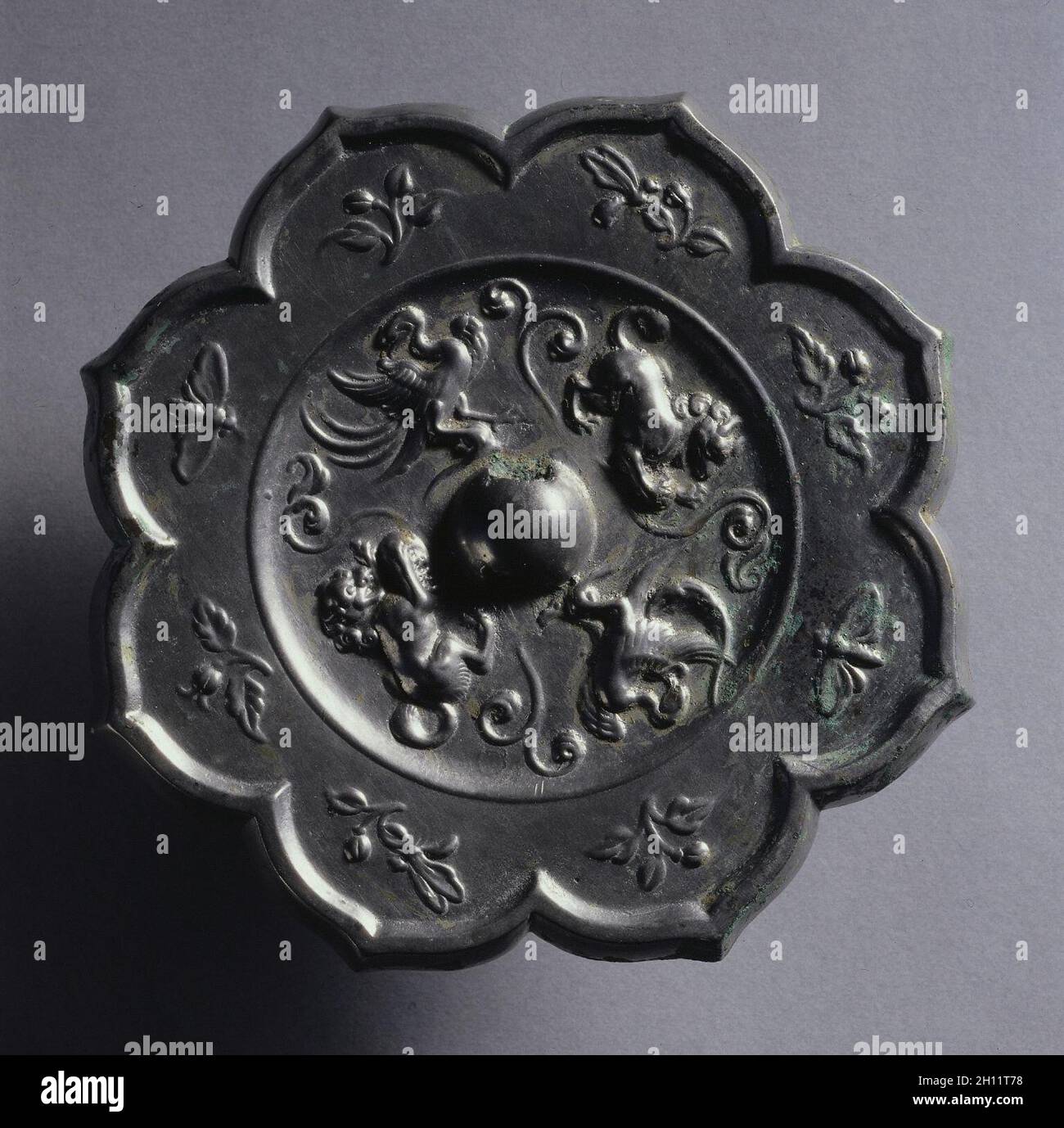 Octafoil Mirror with Paired Phoenixes and Animals, late 600s-early 700s. China, Tang dynasty ...