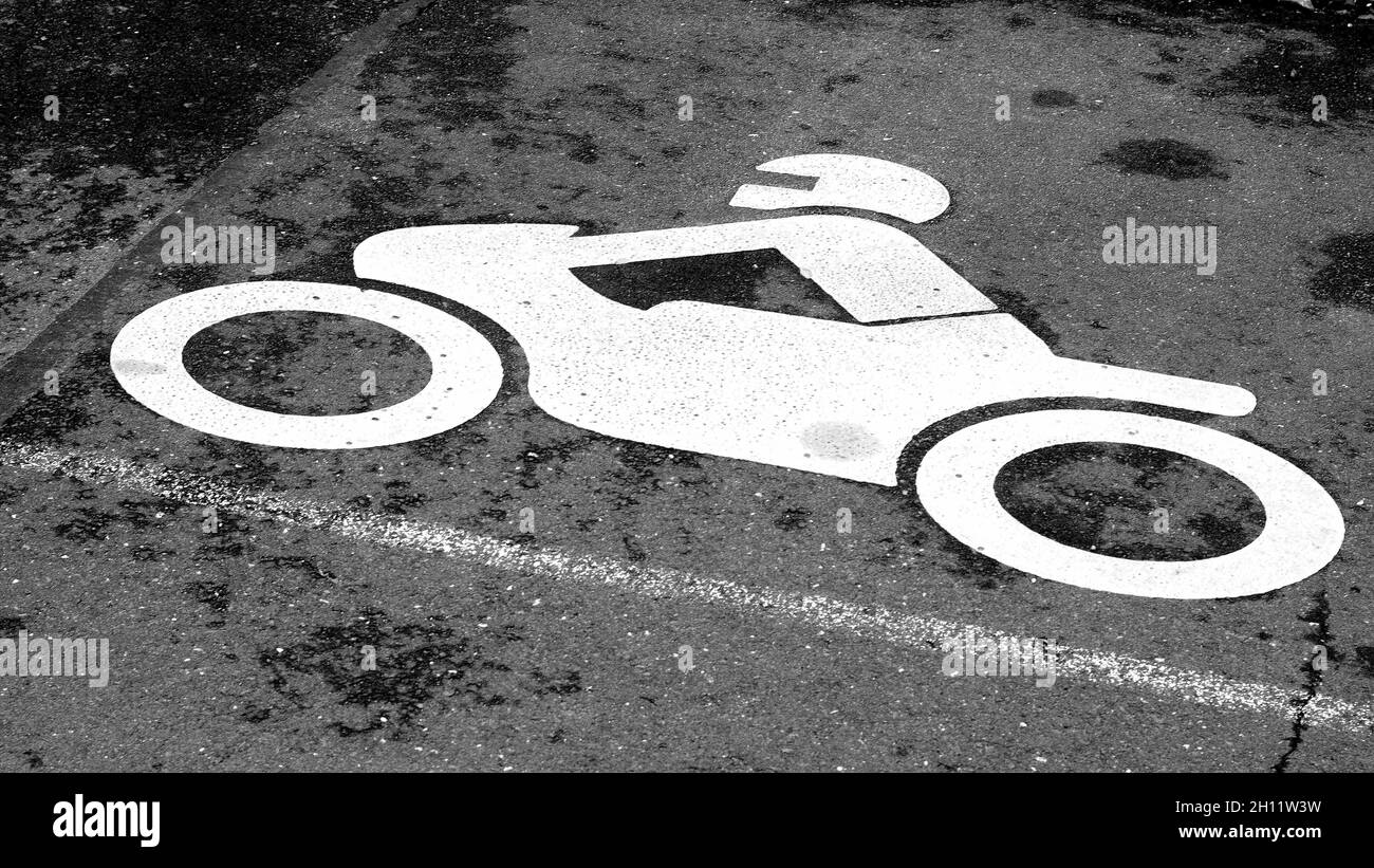 Motorcycle road sign on the asphalt ground Stock Photo - Alamy