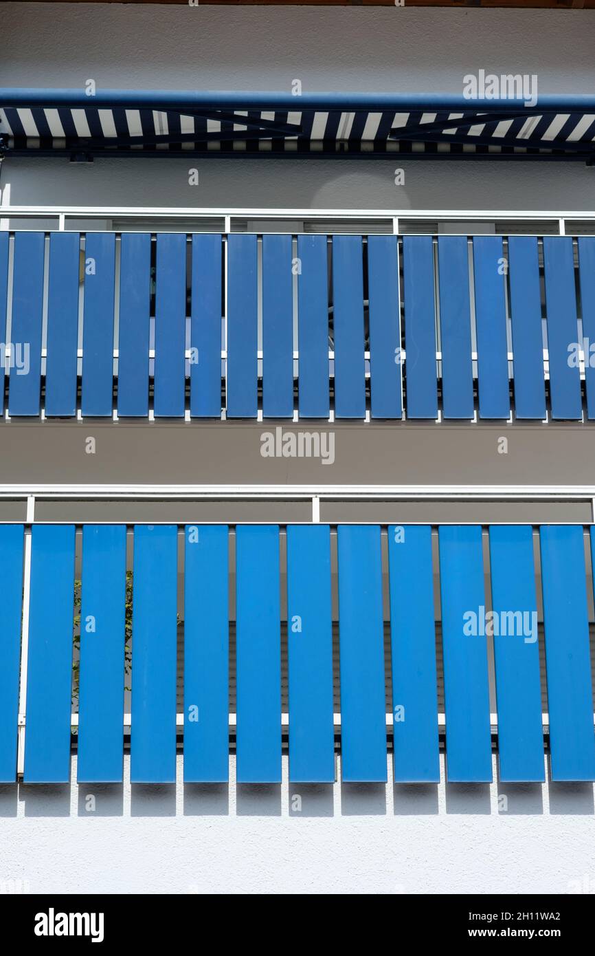 Blue balcony with a balustrade of aluminum Stock Photo - Alamy