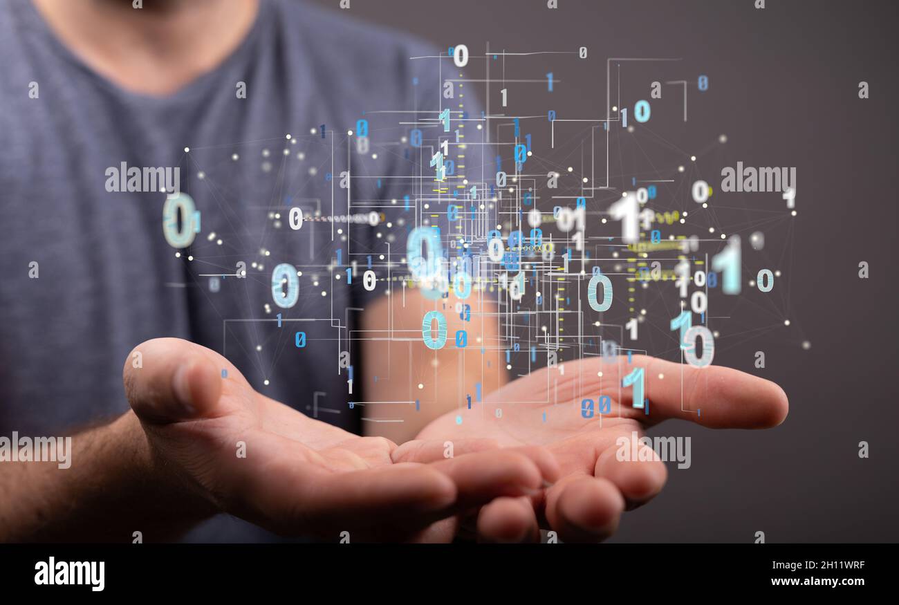Illustration of binary codes in a human hand touching a transparent ...