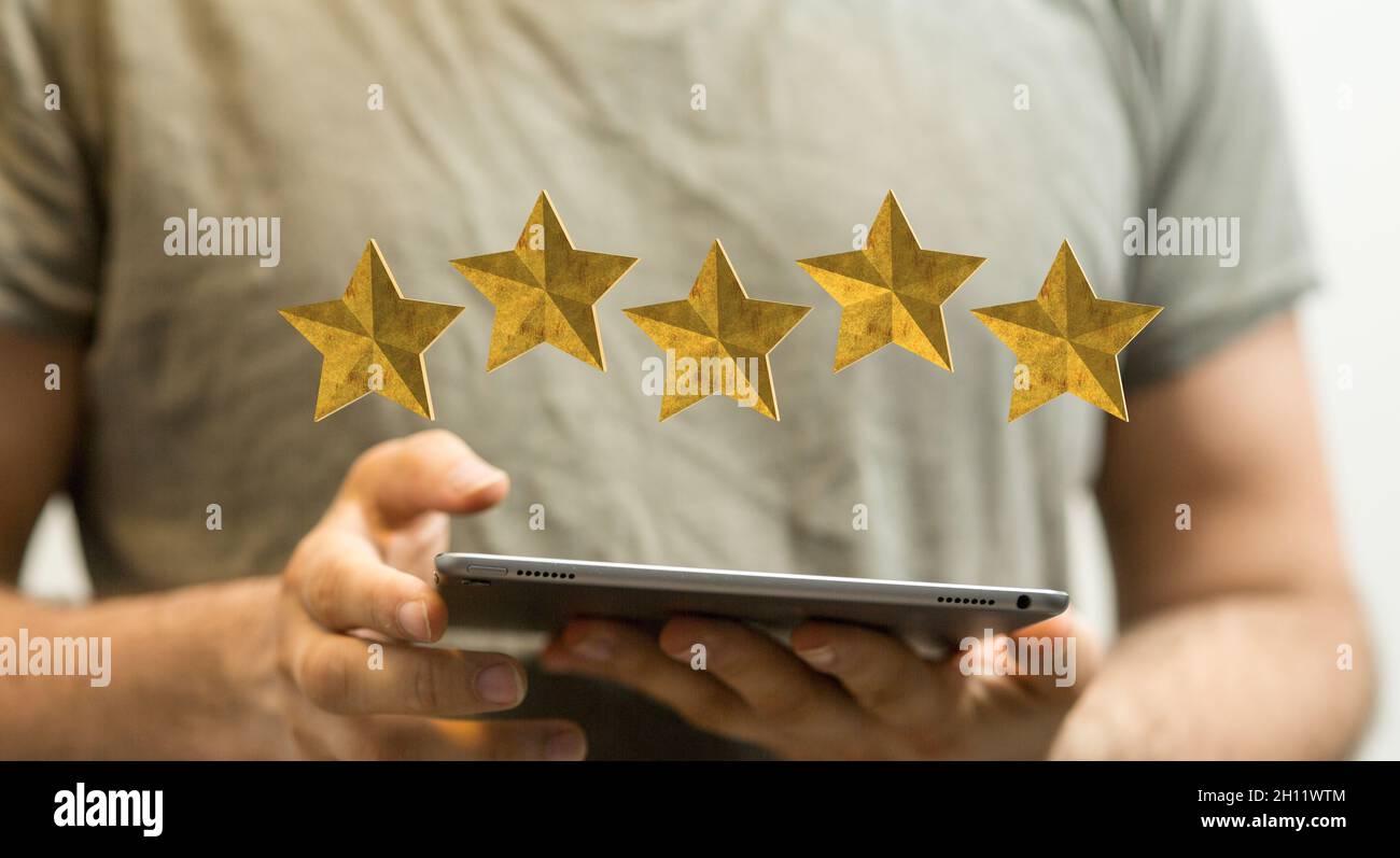 Illustration of stars over a tablet as a concept of feedback, review ...