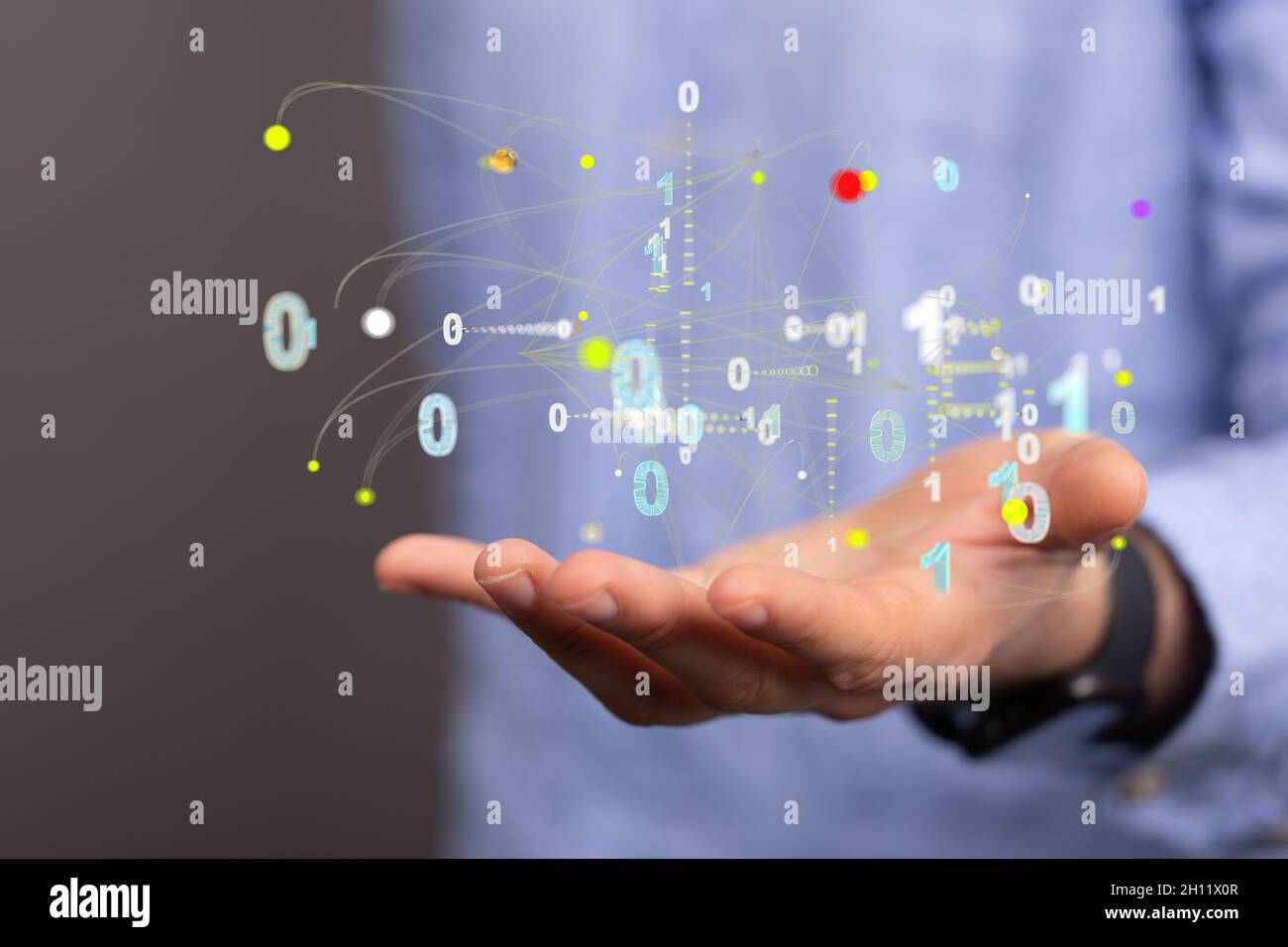 Illustration of binary codes in a human hand Stock Photo - Alamy