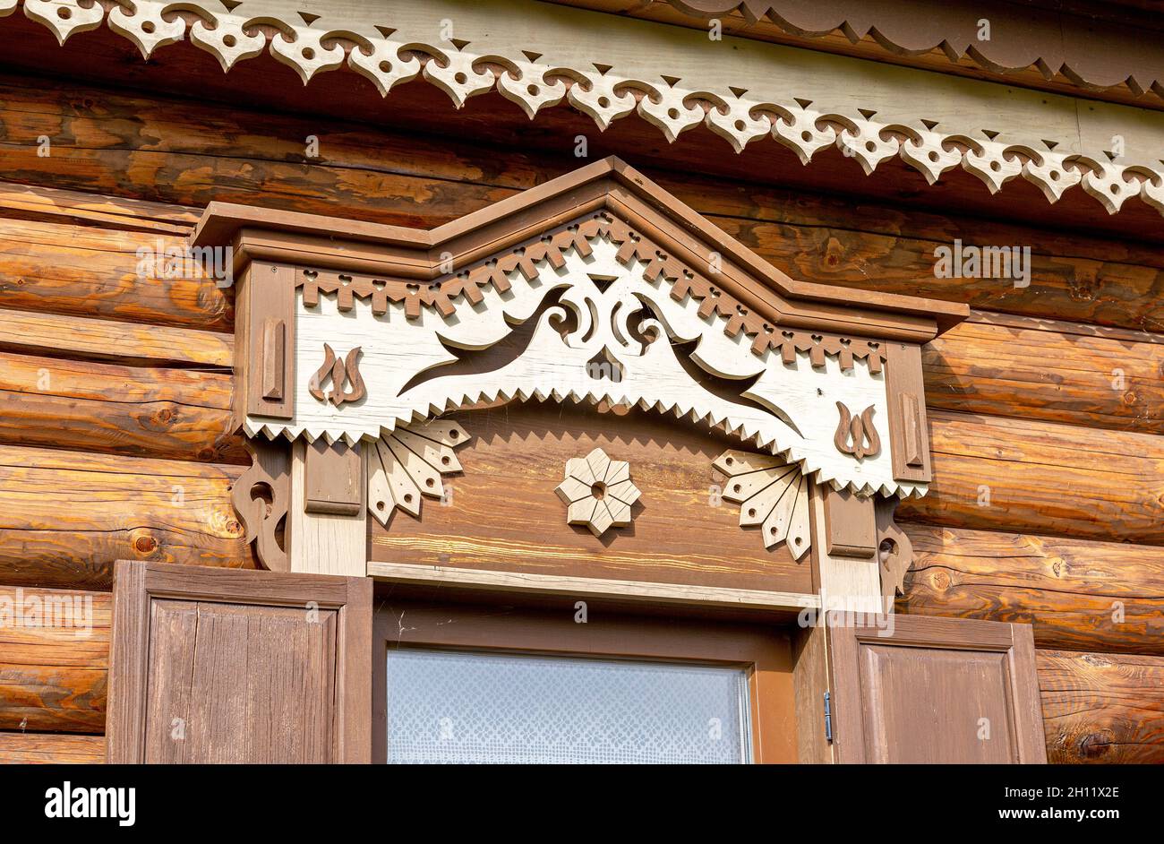 Russian traditional wooden architecture. Windows of wooden house ...
