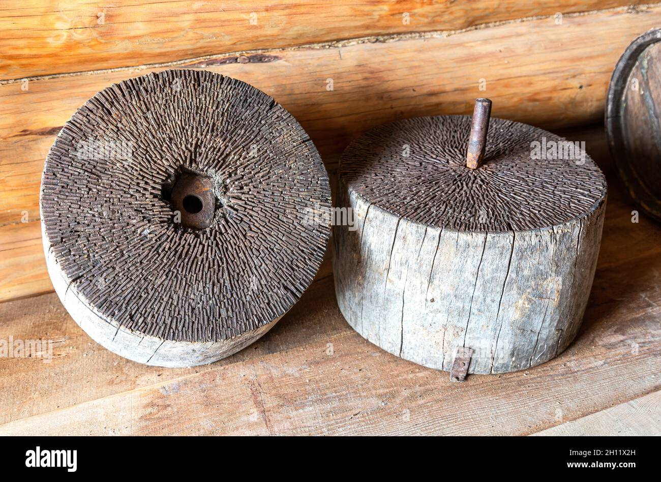 Wooden rotary mill for hand-grinding a grain into flour. Old hand ...