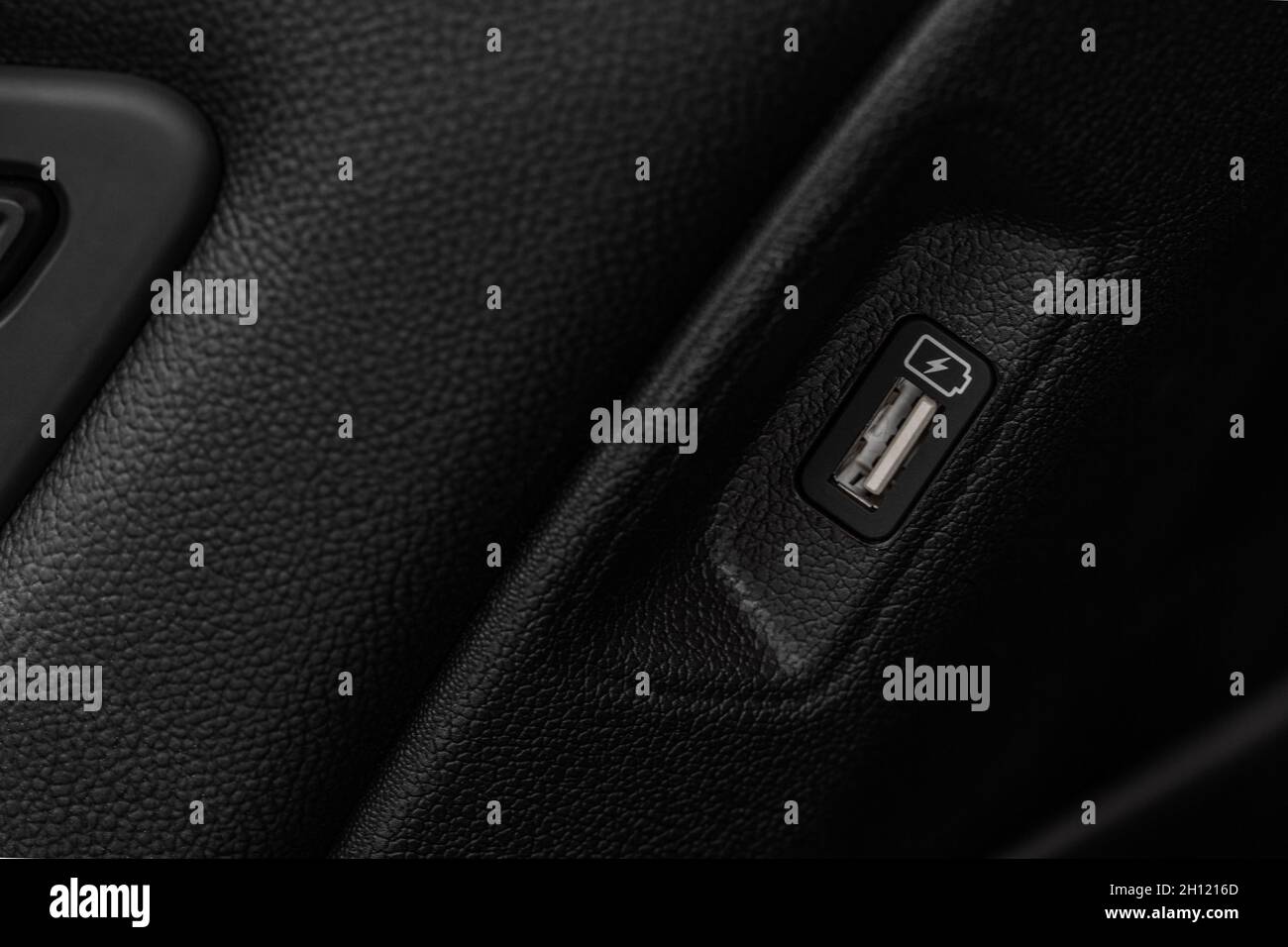 Opened car USB port in the car for connecting device. Power output of ...