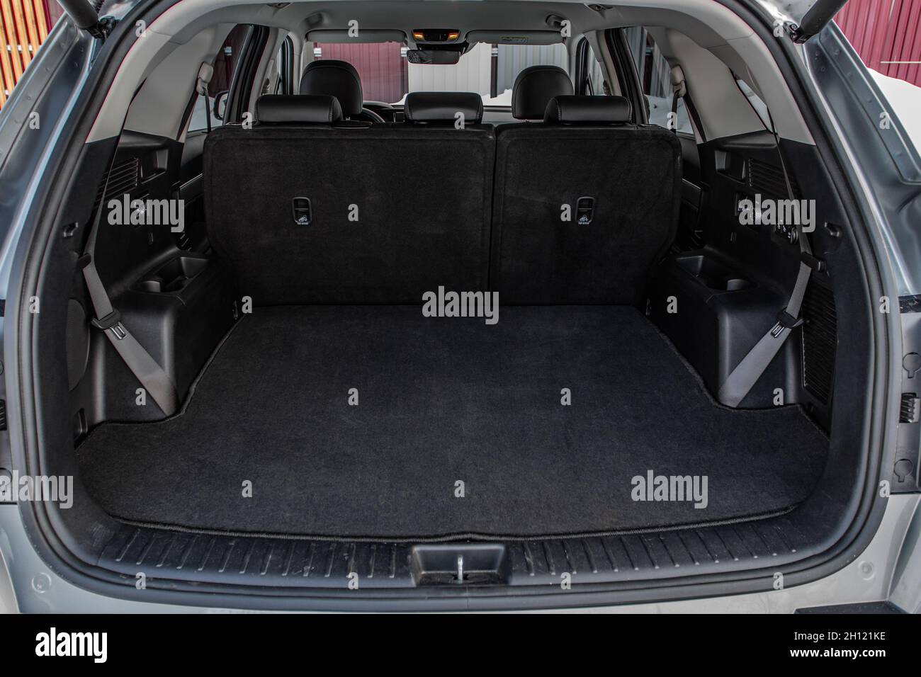 Huge, clean and empty car trunk in interior of compact suv. Rear view ...