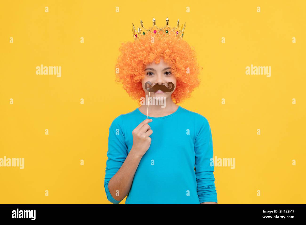 party accessories. imagine herself princess. funny child with party ...