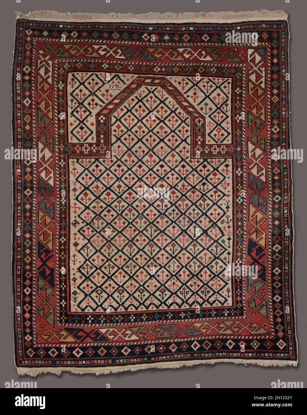 Prayer Rug, c. 1800s. Caucasus, Daghestan, 19th century. Wool and linen ...