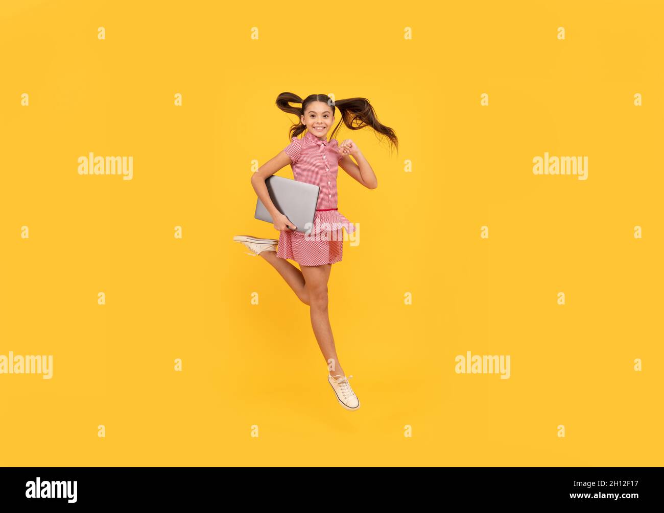 happy child girl hurry up running hold notebook to find sale and ...