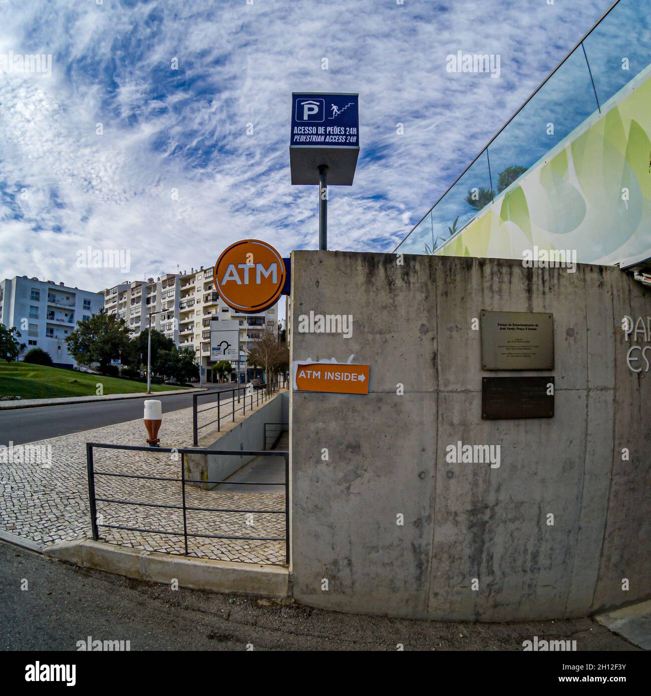 LAGOS, PORTUGAL - Sep 23, 2021: A front view of ATM bank branch and the ...