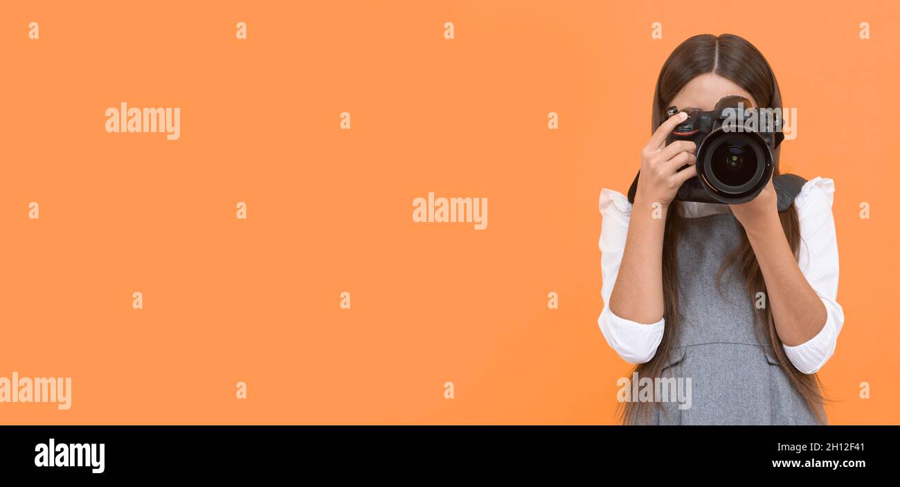 teen girl taking photo. kid use digital camera. child photographing ...