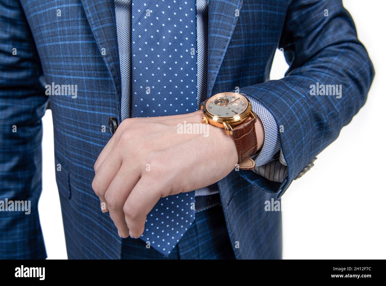 Use your time wisely. Luxury watch worn on male wrist. Time management ...