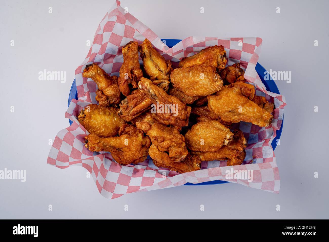 Closeup top view of a fried chicken bites isolated on a white ...