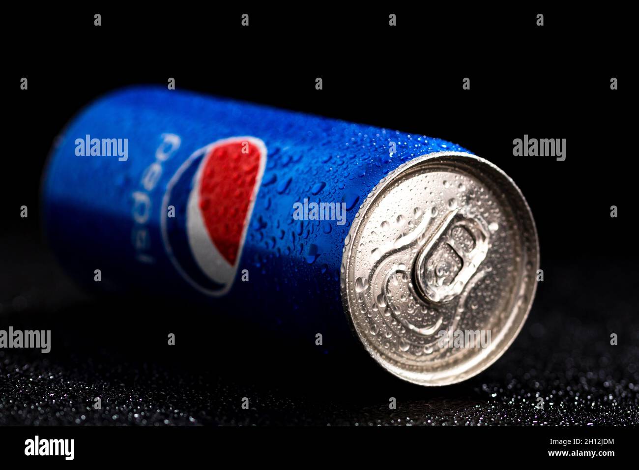 Editorial photo of Pepsi can with water droplets on black background ...
