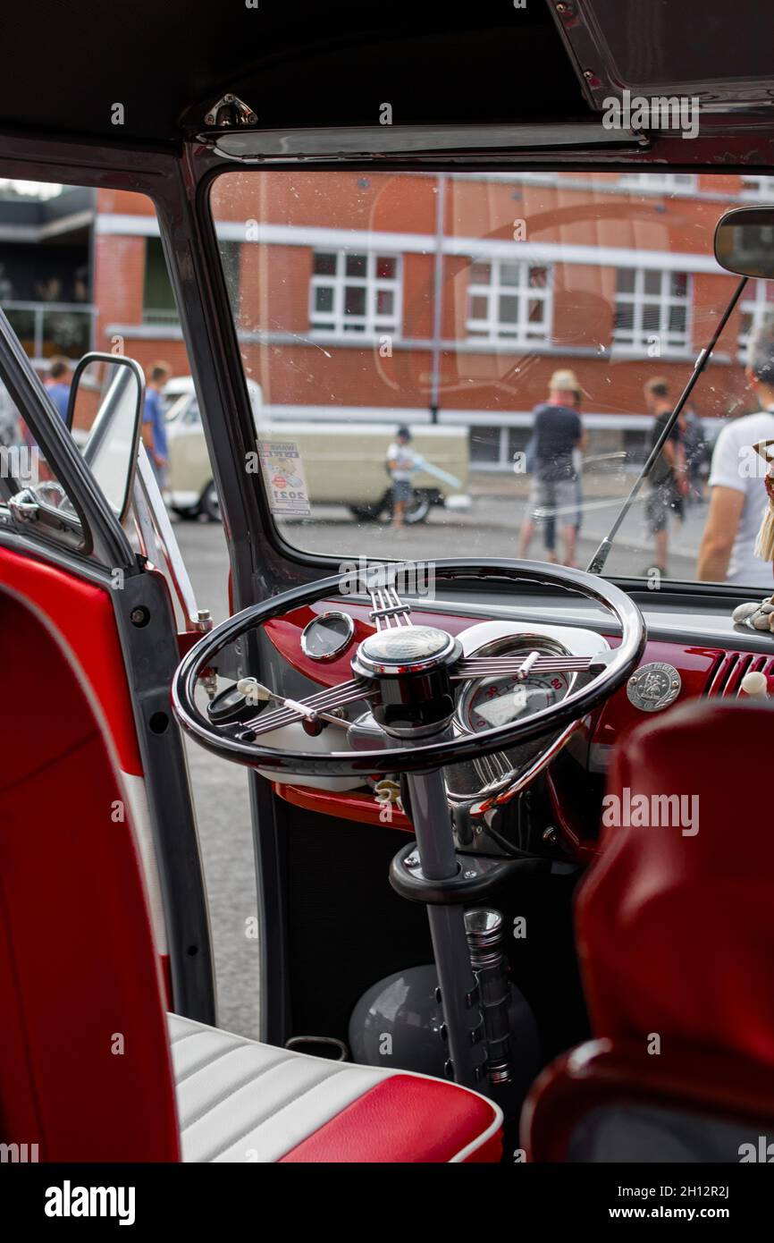 Vertical shot of a red Volkswagen bus steering wheel Stock Photo - Alamy