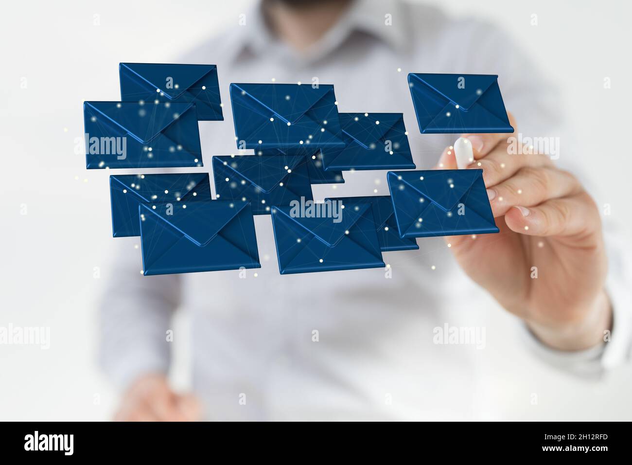 Man tapping floating 3D rendered blue mail icons Stock Photo - Alamy