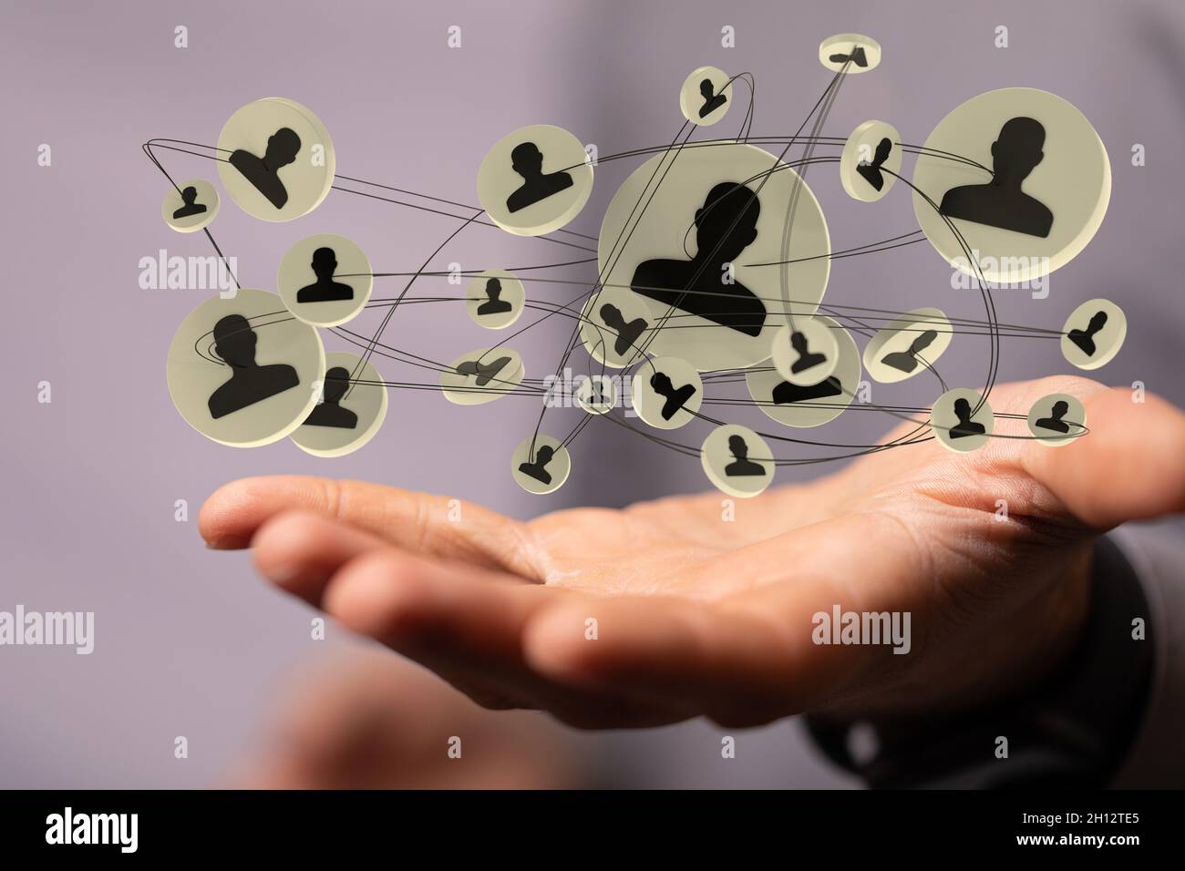 3D rendering of person icons network hovering over a man's hands Stock ...