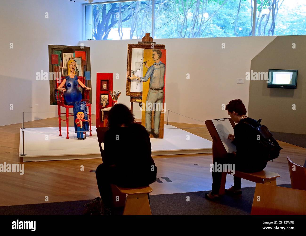 DALLAS, UNITED STATES - Sep 23, 2013: A back view of two artists ...
