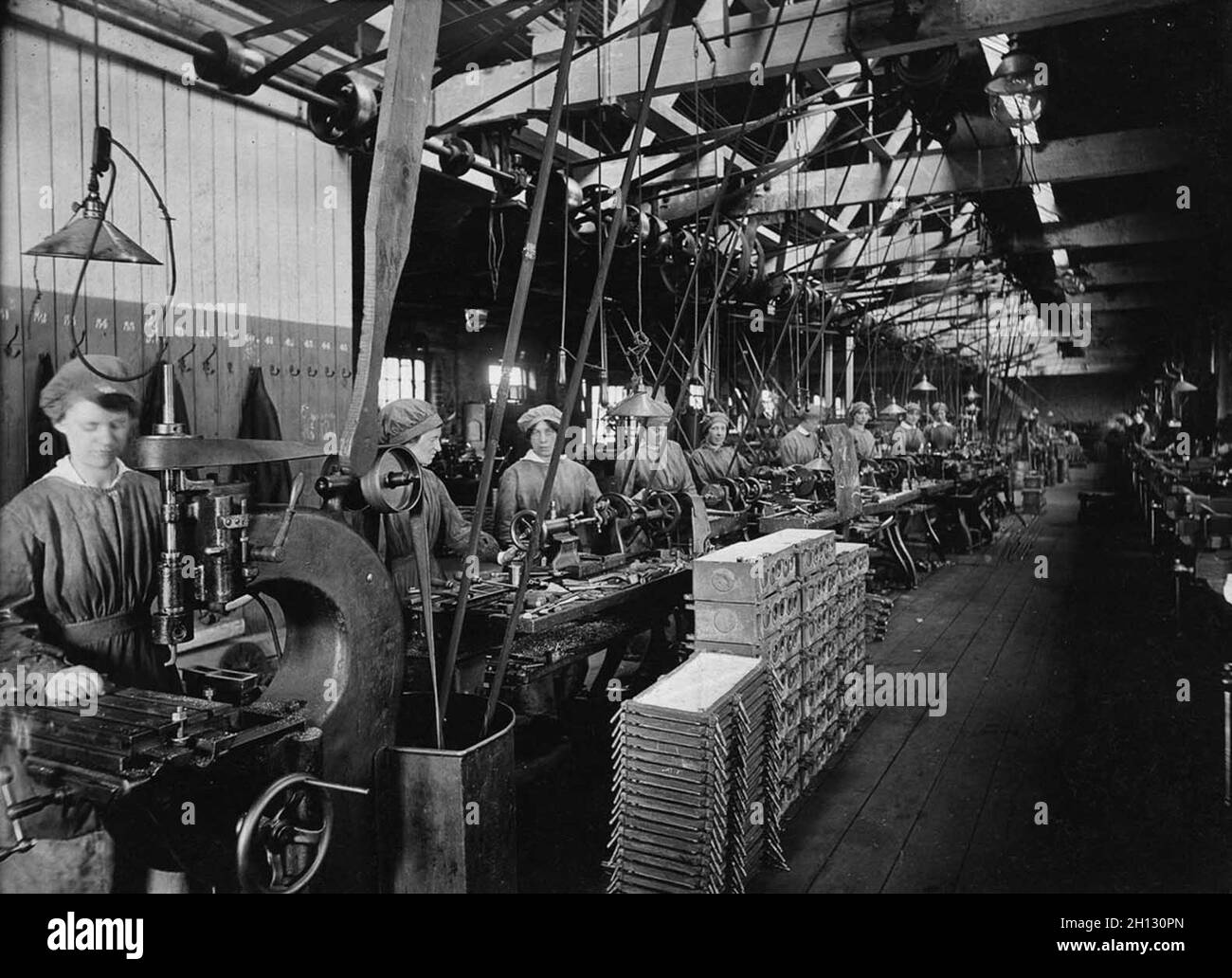 Women workers making electrical fittings in a factory during WW1 Stock ...