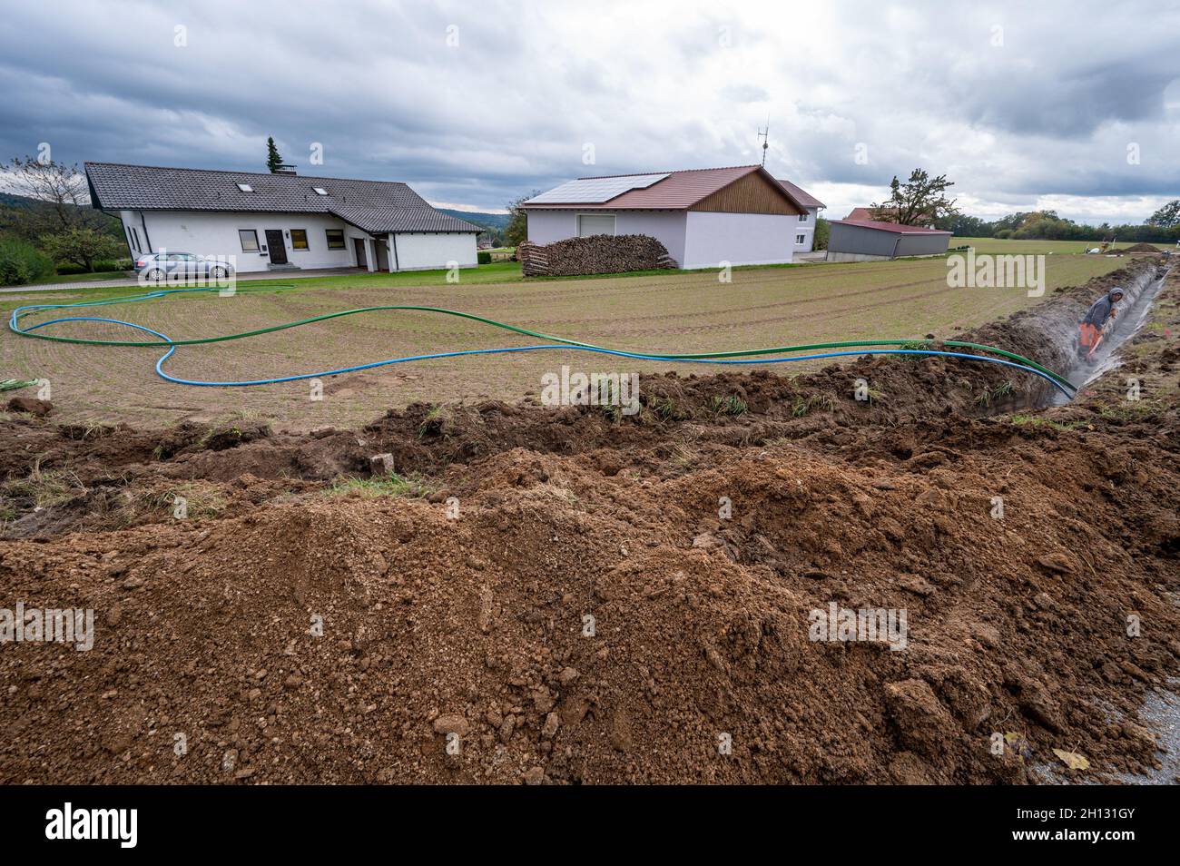 Wald, Germany. 12th Oct, 2021. Fiber optic cables are laid in the ...