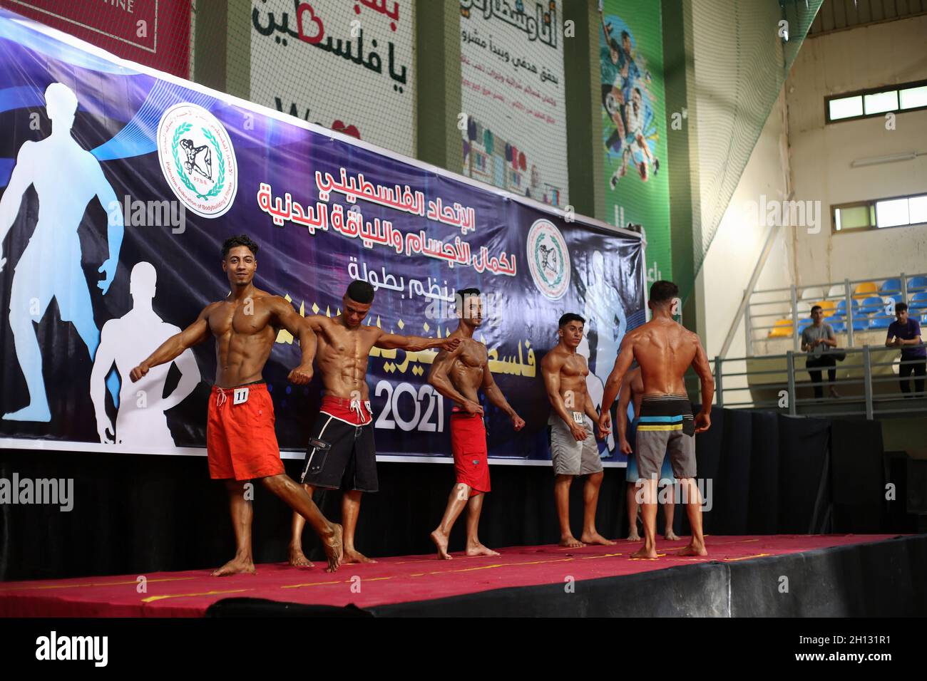 Gaza, Palestine. 15th Oct, 2021. Athletes display their body muscles ...