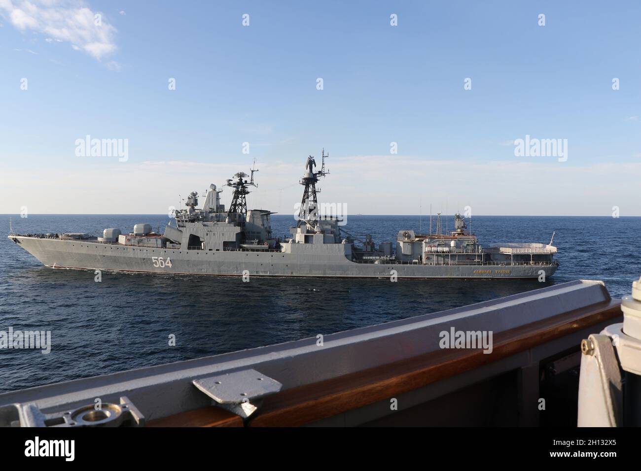 SEA OF JAPAN (Oct. 15, 2021) A Russian Udaloy-class destroyer interacts ...