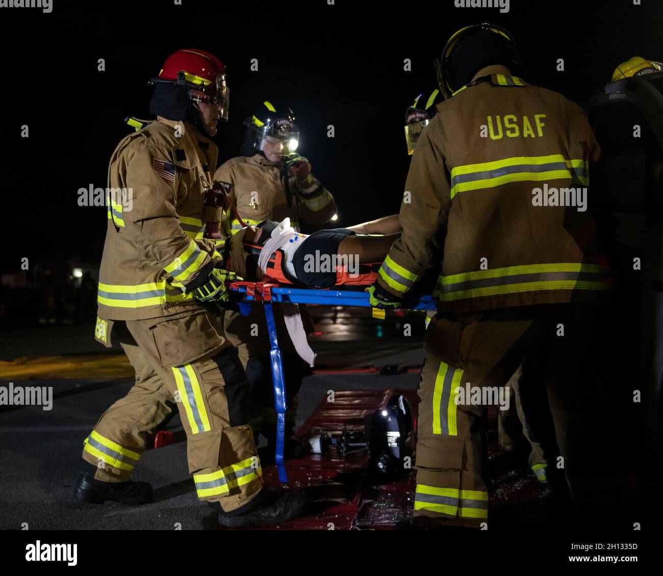 U.S. Air Force firefighters assigned to the 18th Civil Engineering ...