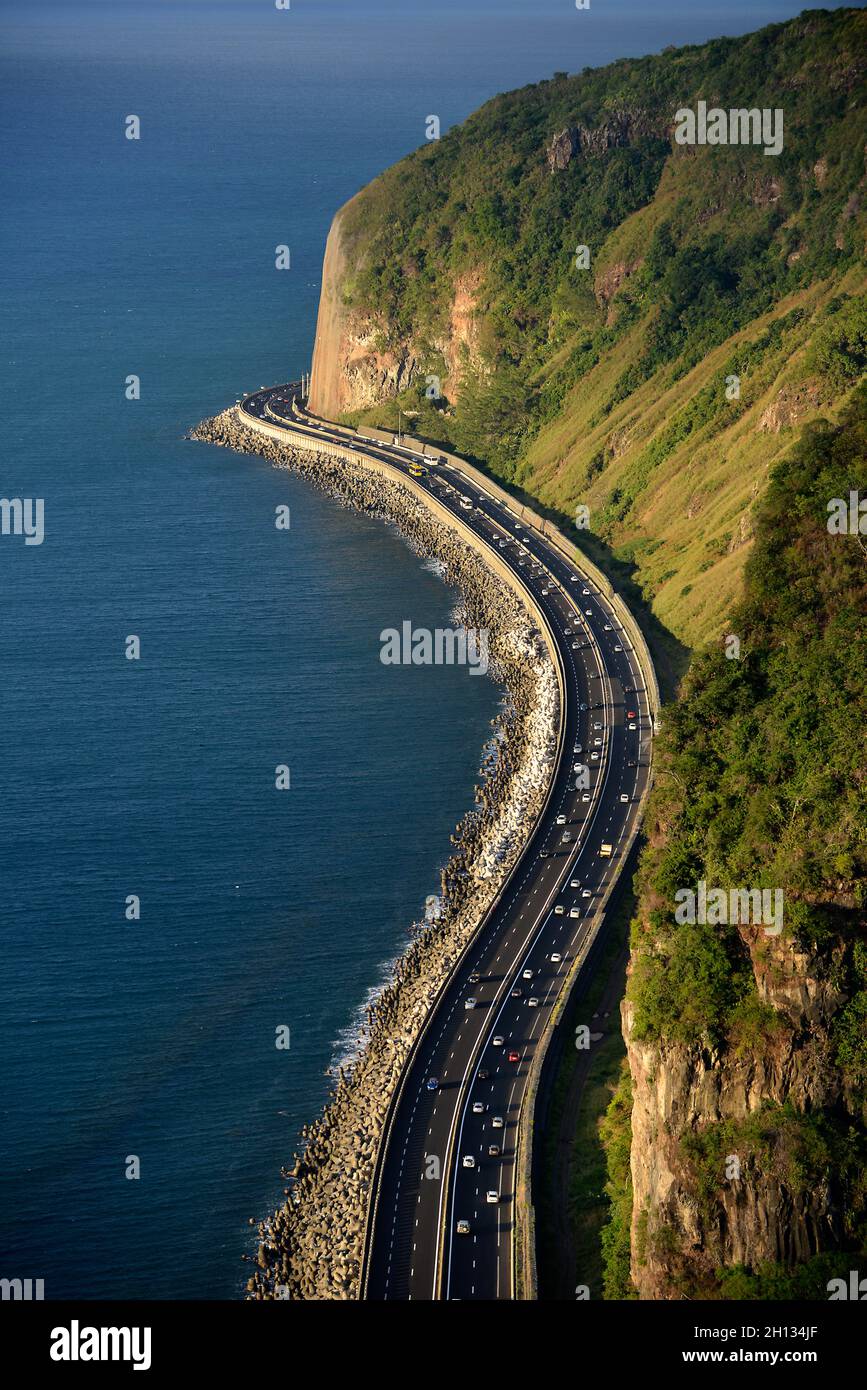 FRANCE. REUNION ISLAND, THE COASTLINE ROAD BETWEEN LA POSSESSION AND ...