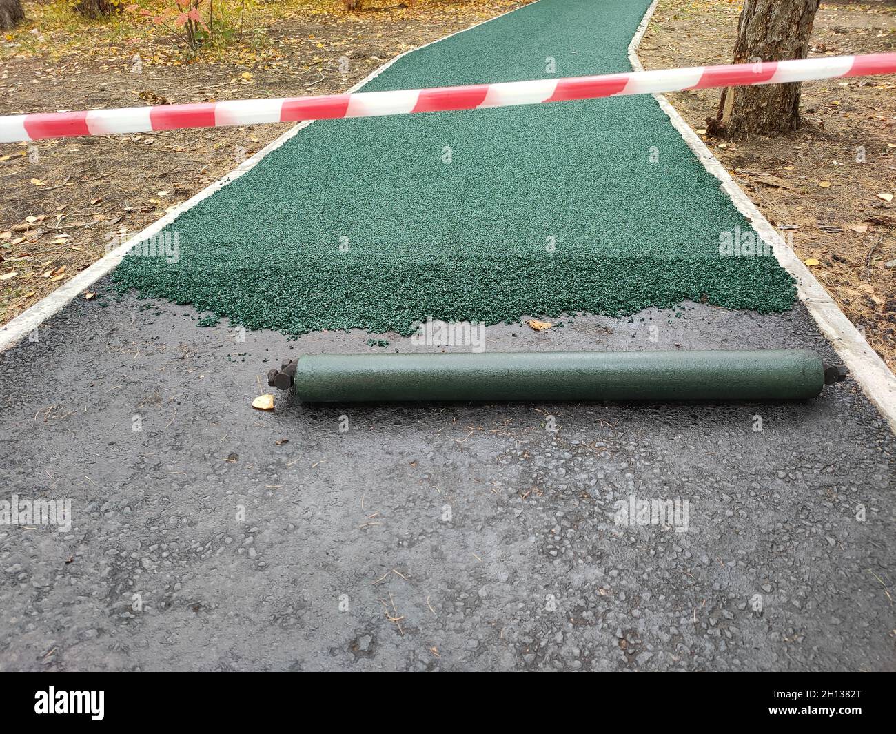 Treadmill rubber coating in park. Soft coating for jogging and running ...