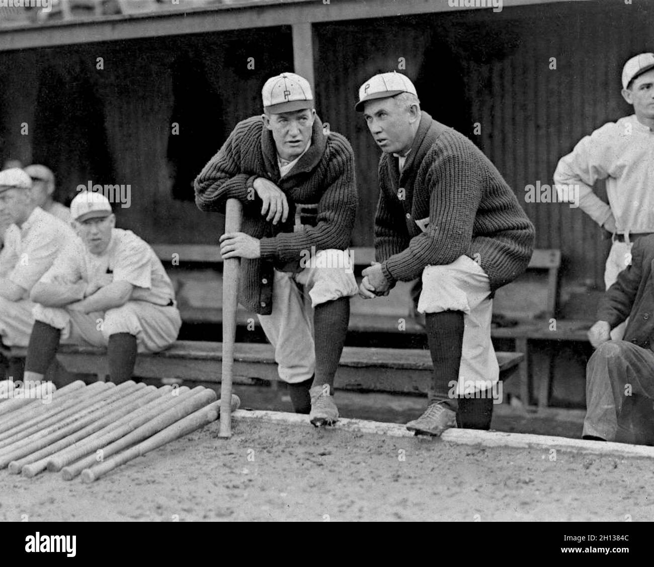 Grover Cleveland Alexander & manager Pat Moran. In background are Joe ...