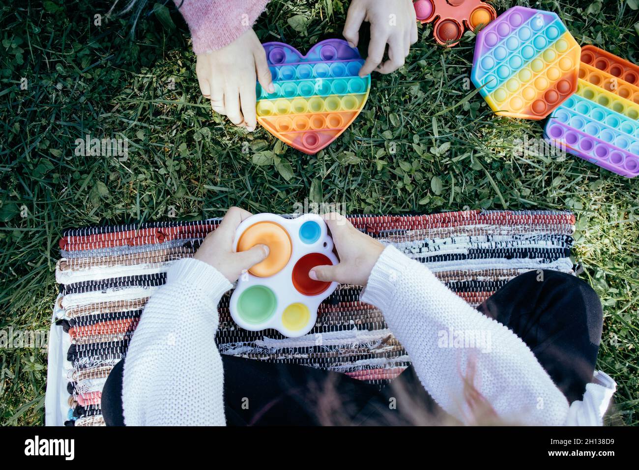 Playing poppit hi-res stock photography and images - Alamy