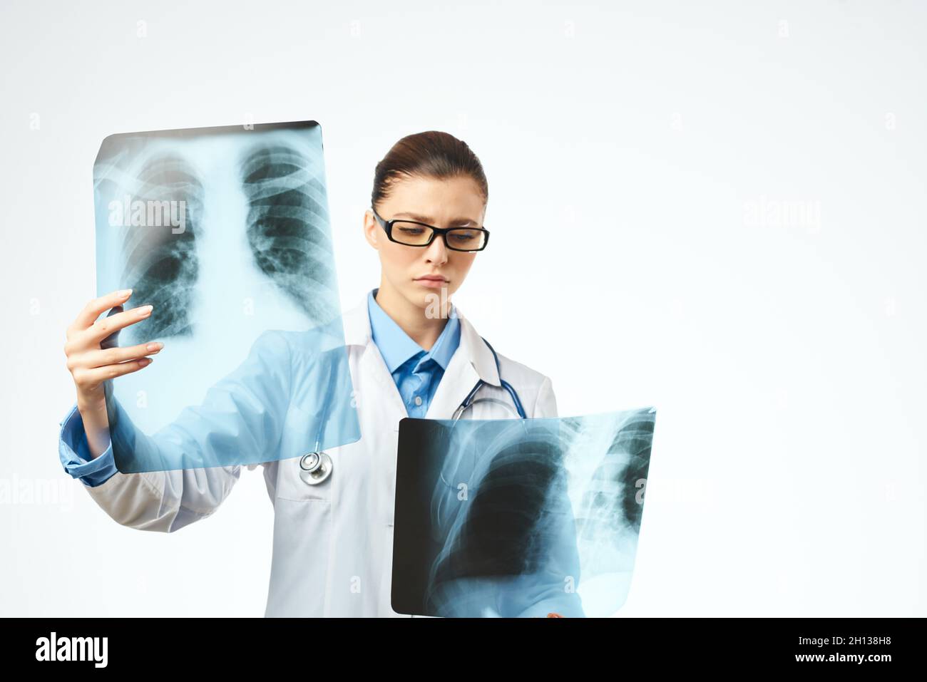 nurse with x-ray health care light background Stock Photo - Alamy