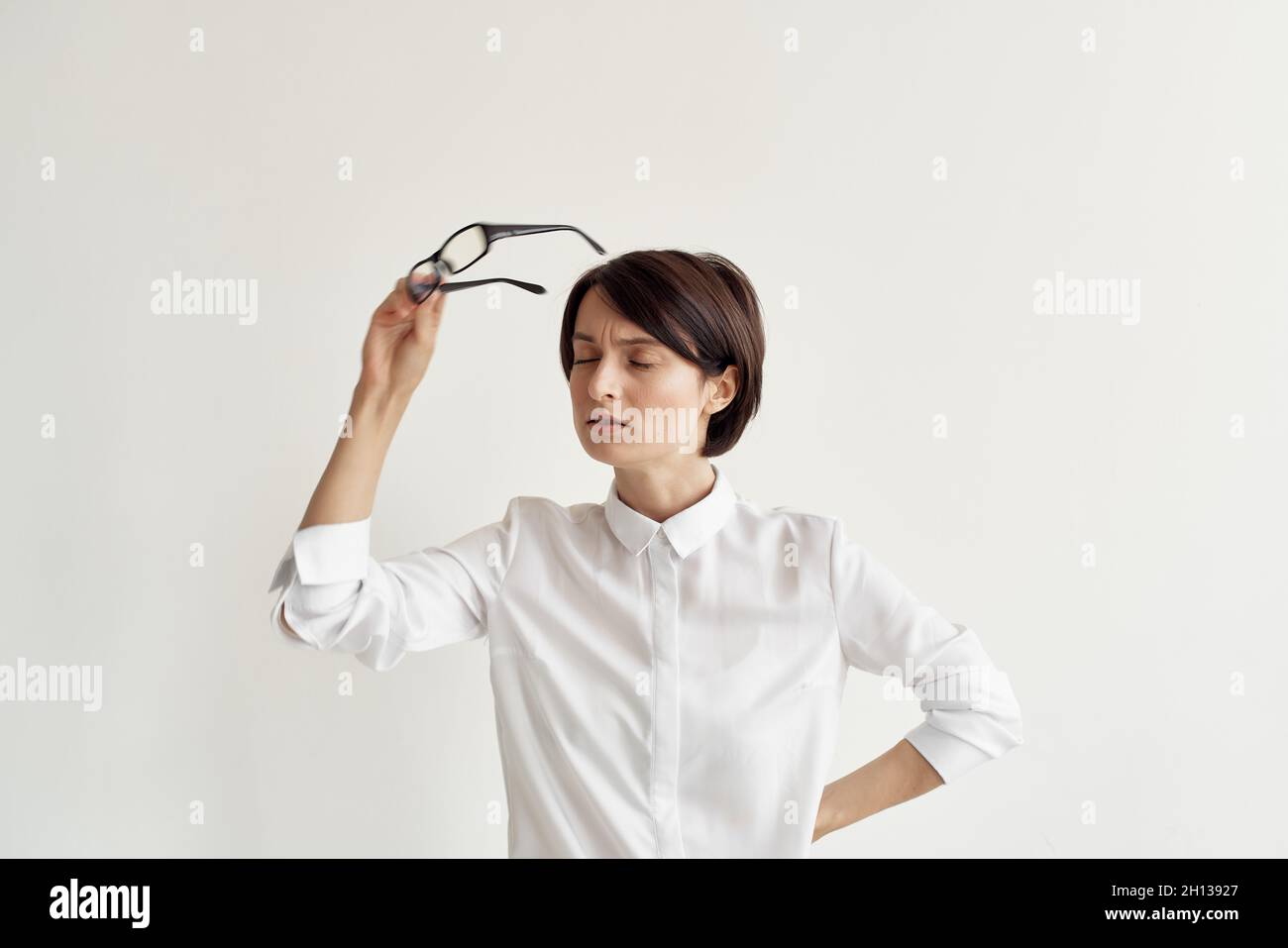 female manager with glasses self-confidence light background Stock ...