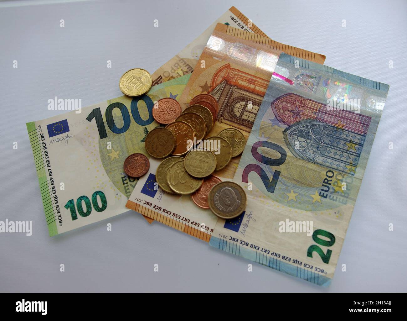 various euro banknotes and coins Stock Photo - Alamy