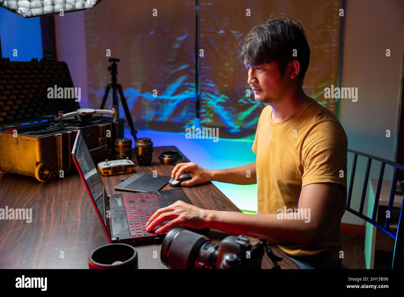 A man makes video editing. Video production. Color Correction. Sound ...