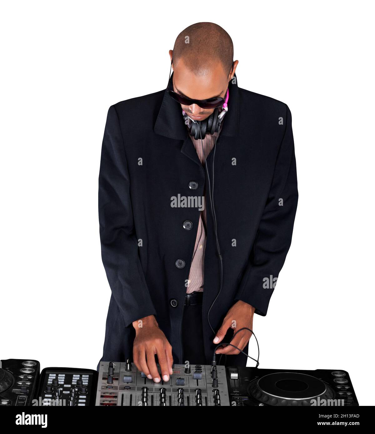 African musician singer turning knobs at the turntable of a DJ music ...