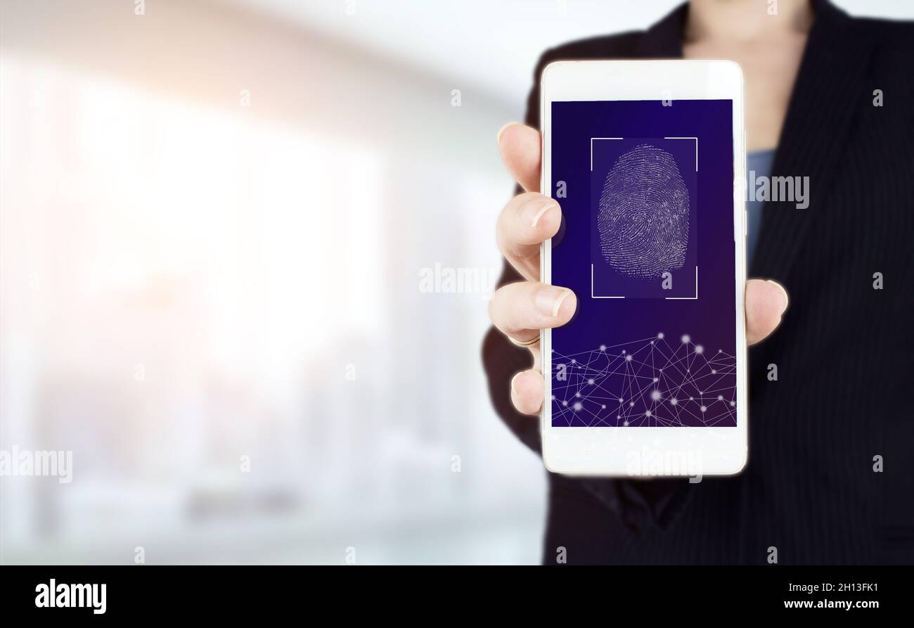 Password control through fingerprints. Hand hold white smartphone with ...