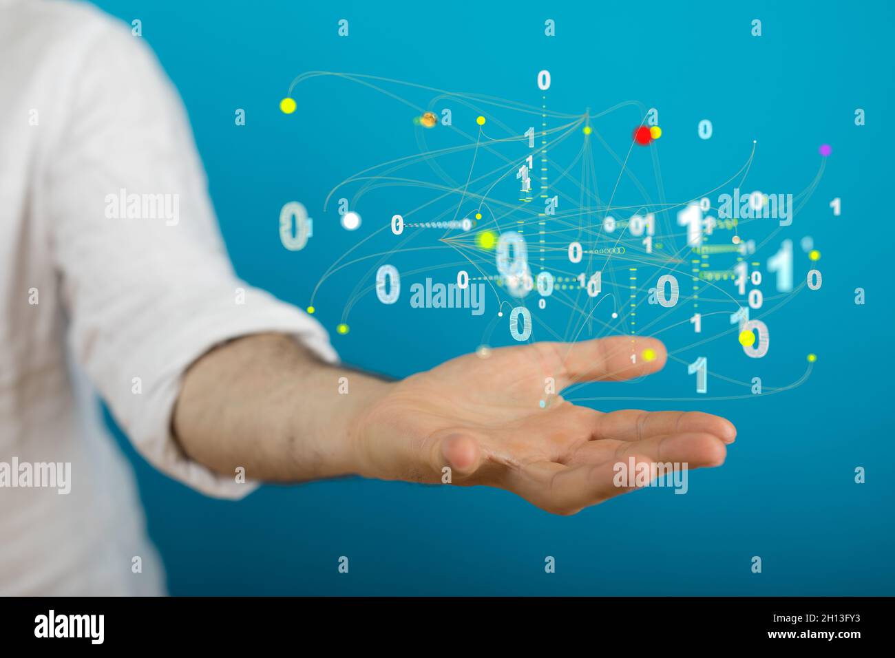 Abstract shot of a man's hands presenting digital networking ...