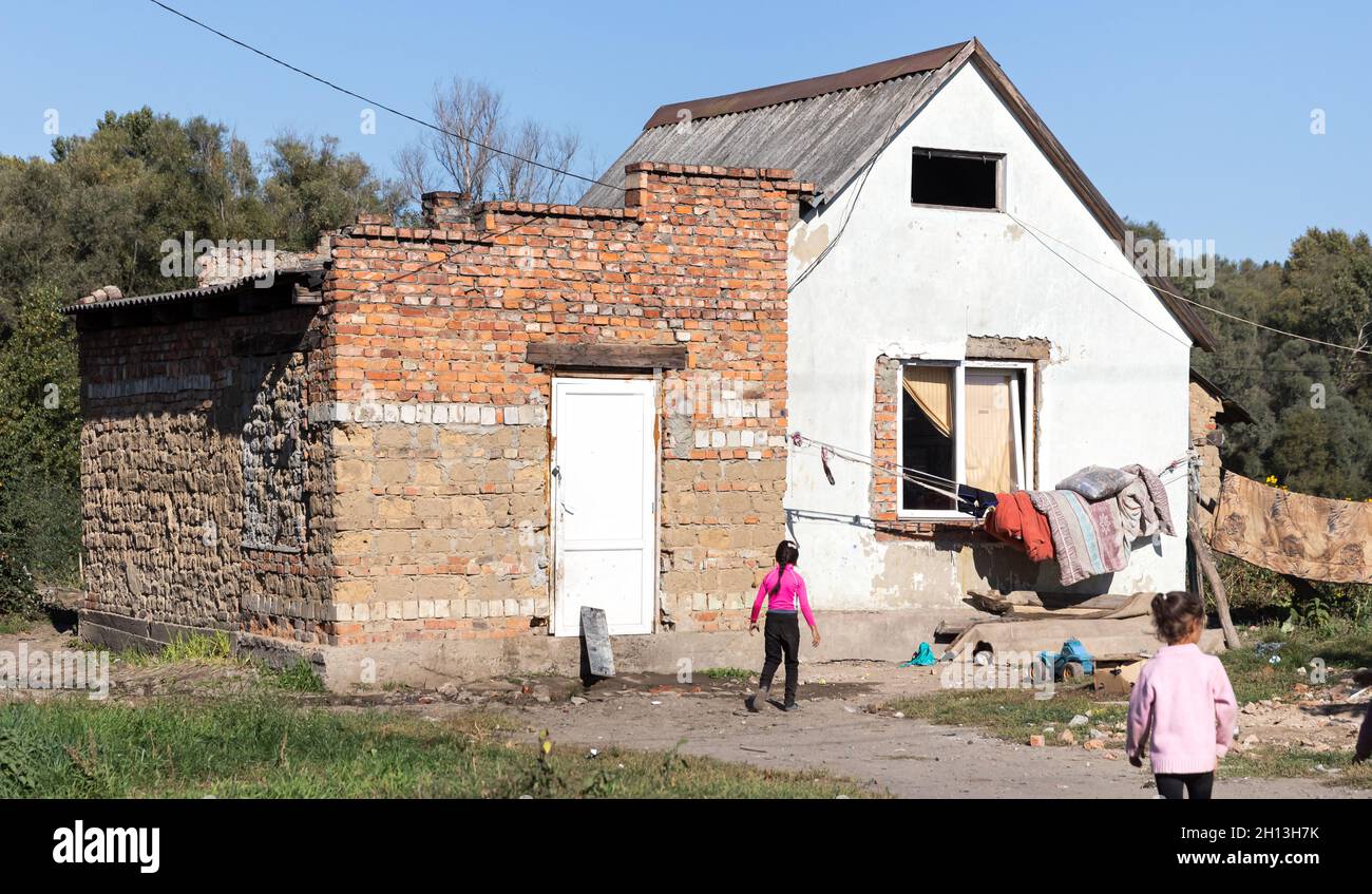 Roma houses. Gypsy slums on the outskirts of Uzhgorod in a roma village ...