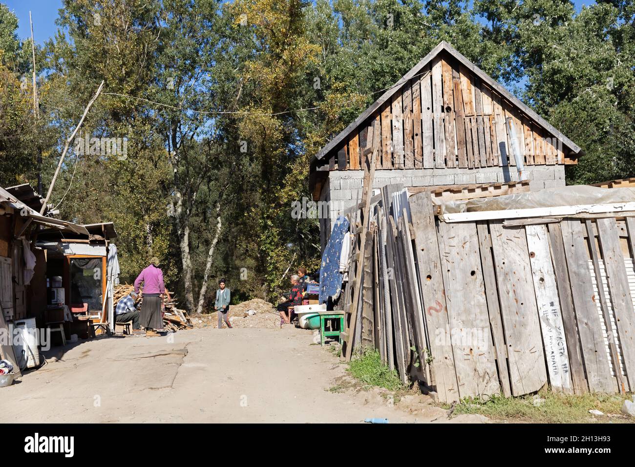 UZHGOROD, UKRAINE - Oct. 10, 2021: Roma houses. Gypsy slums on the ...