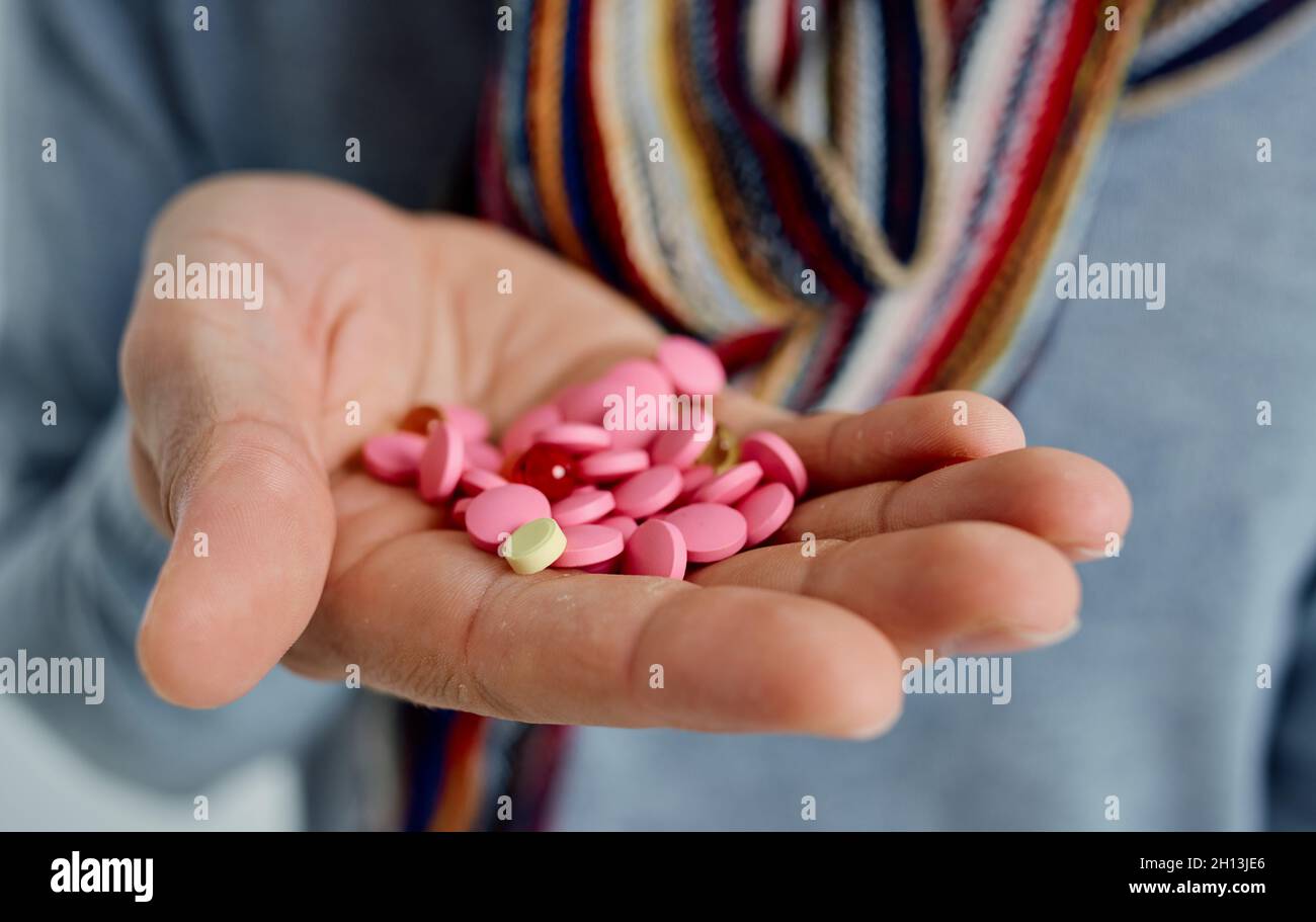 sick man with a scarf around his neck flu health problems light ...