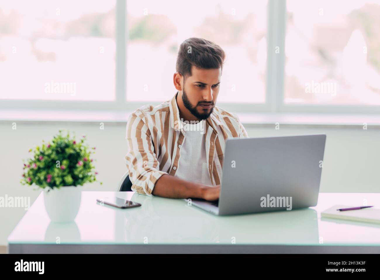 Indian man working at office hi-res stock photography and images - Alamy
