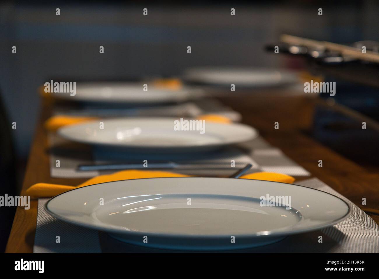 Closeup of an empty plate on the table. Selected focus Stock Photo - Alamy