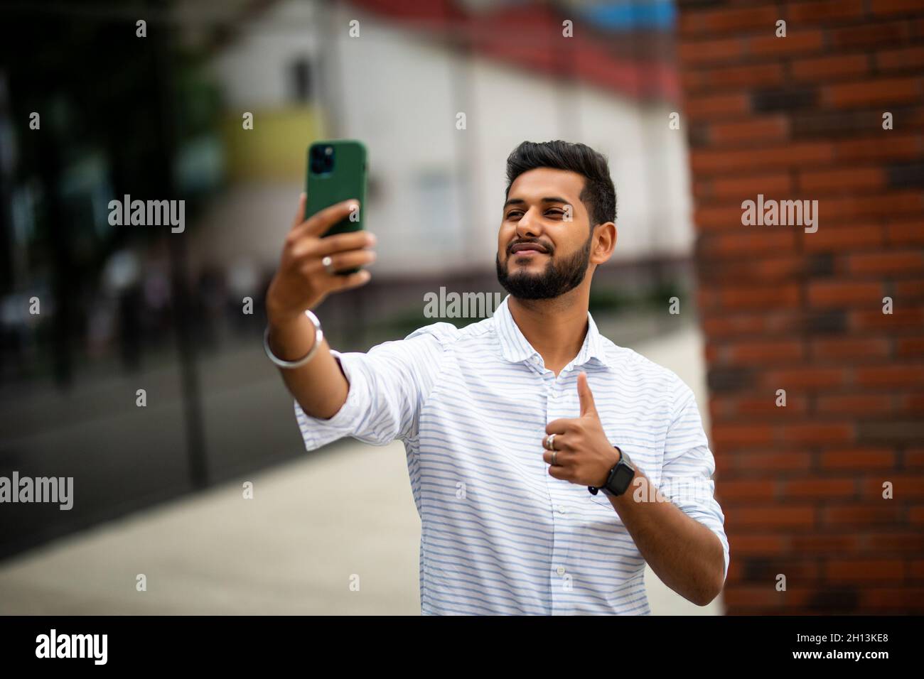 Social media communication. Casual man video call using mobile smart ...