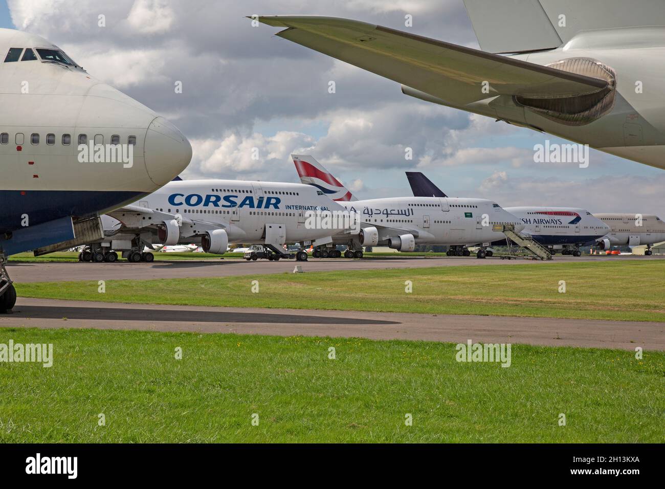 A row of Boeing 747 airliners at Cotswold Airport in England, waiting ...