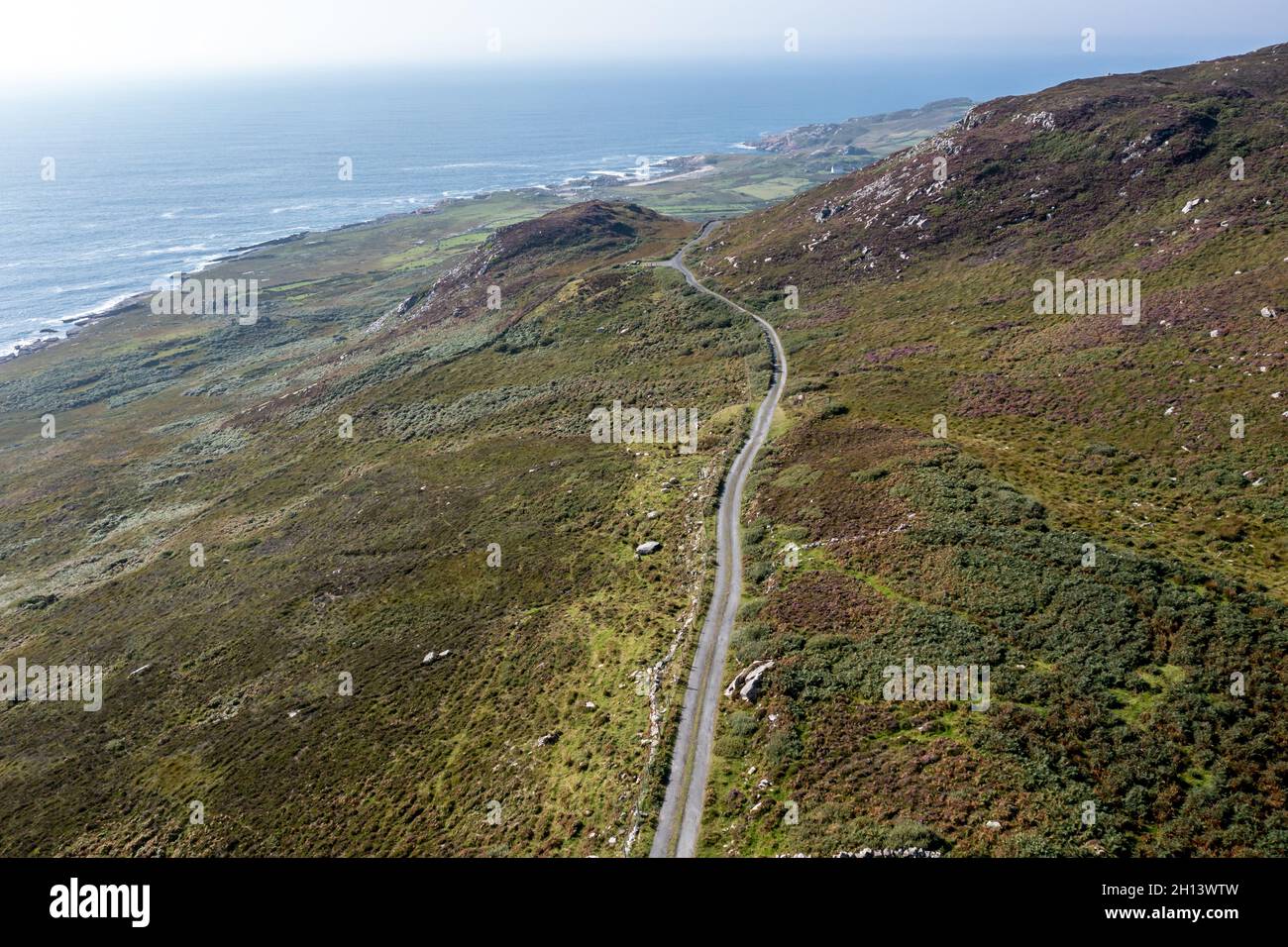 Aerial view of the coastal single track road between Meenacross and ...