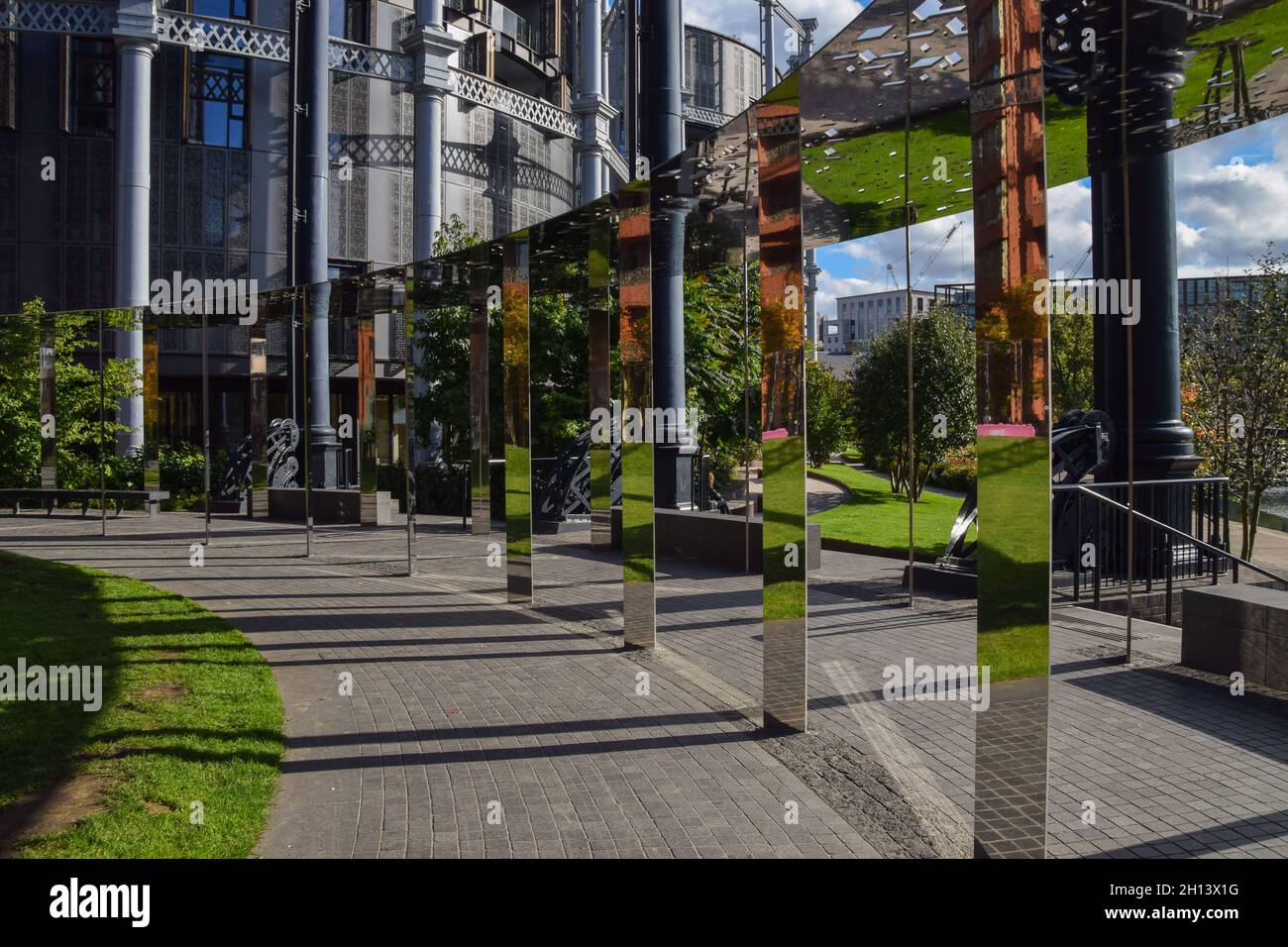 Gasholder Park mirrors next to Gasholders Buildings in King's Cross ...