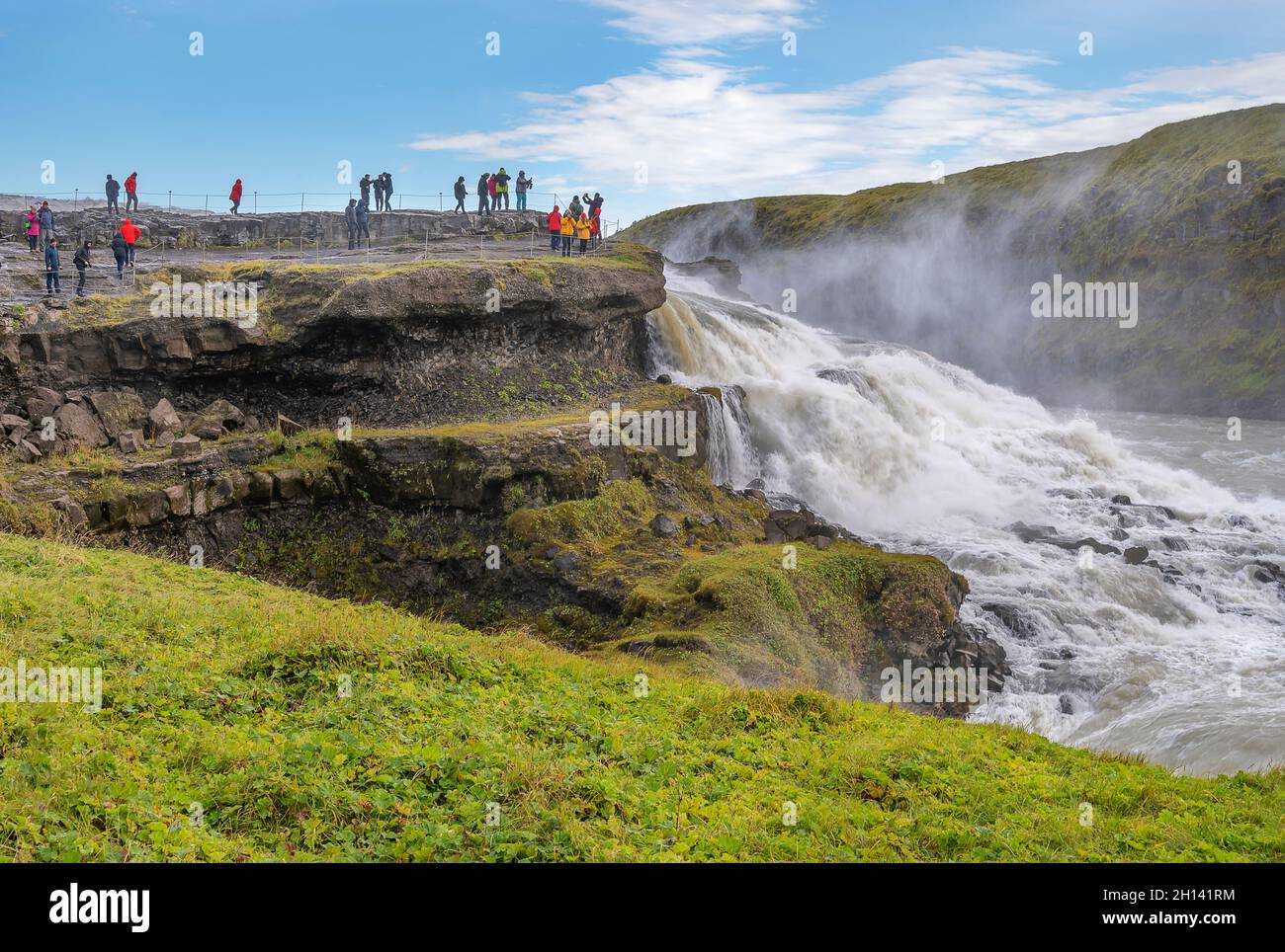 Gullfoss, Iceland – September 25, 2021: A group of people stand at one ...