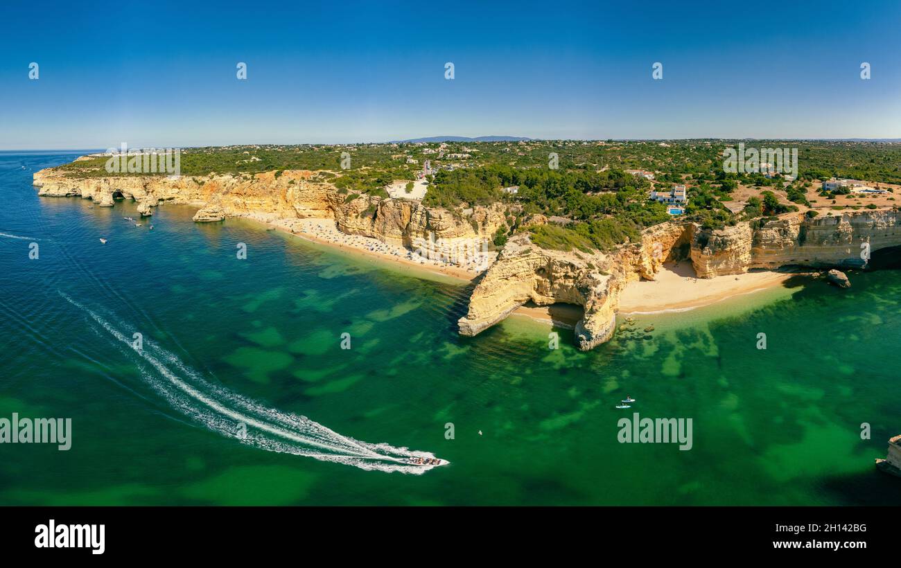 Aerial drone views of Praia da Marinha and Malhada do Baraco - beaches ...